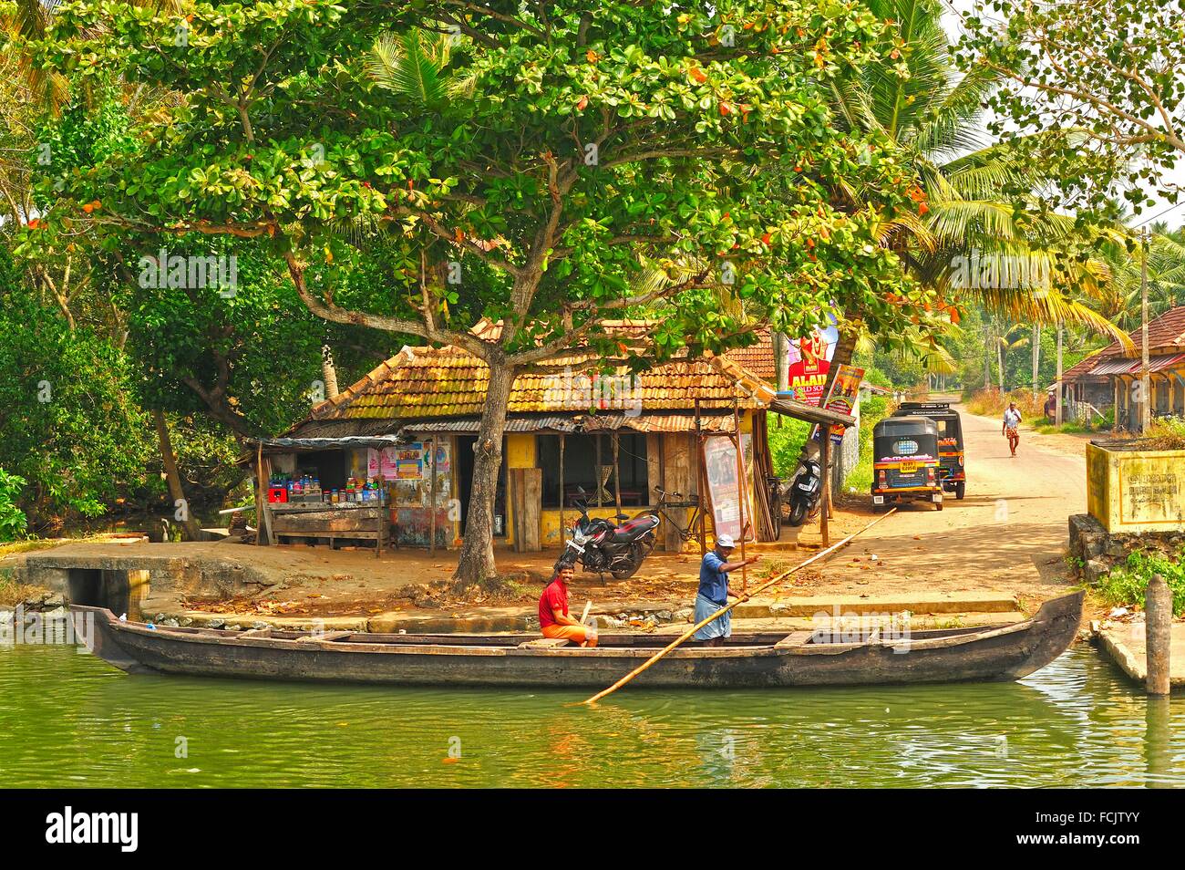 canoe in backwaters between Kollam and Cochin, Kerala, India Stock ...