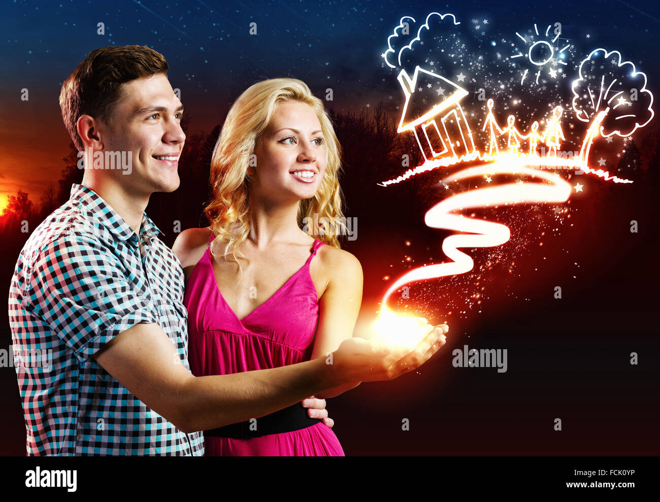 Young happy couple dreaming about family and future life Stock Photo ...