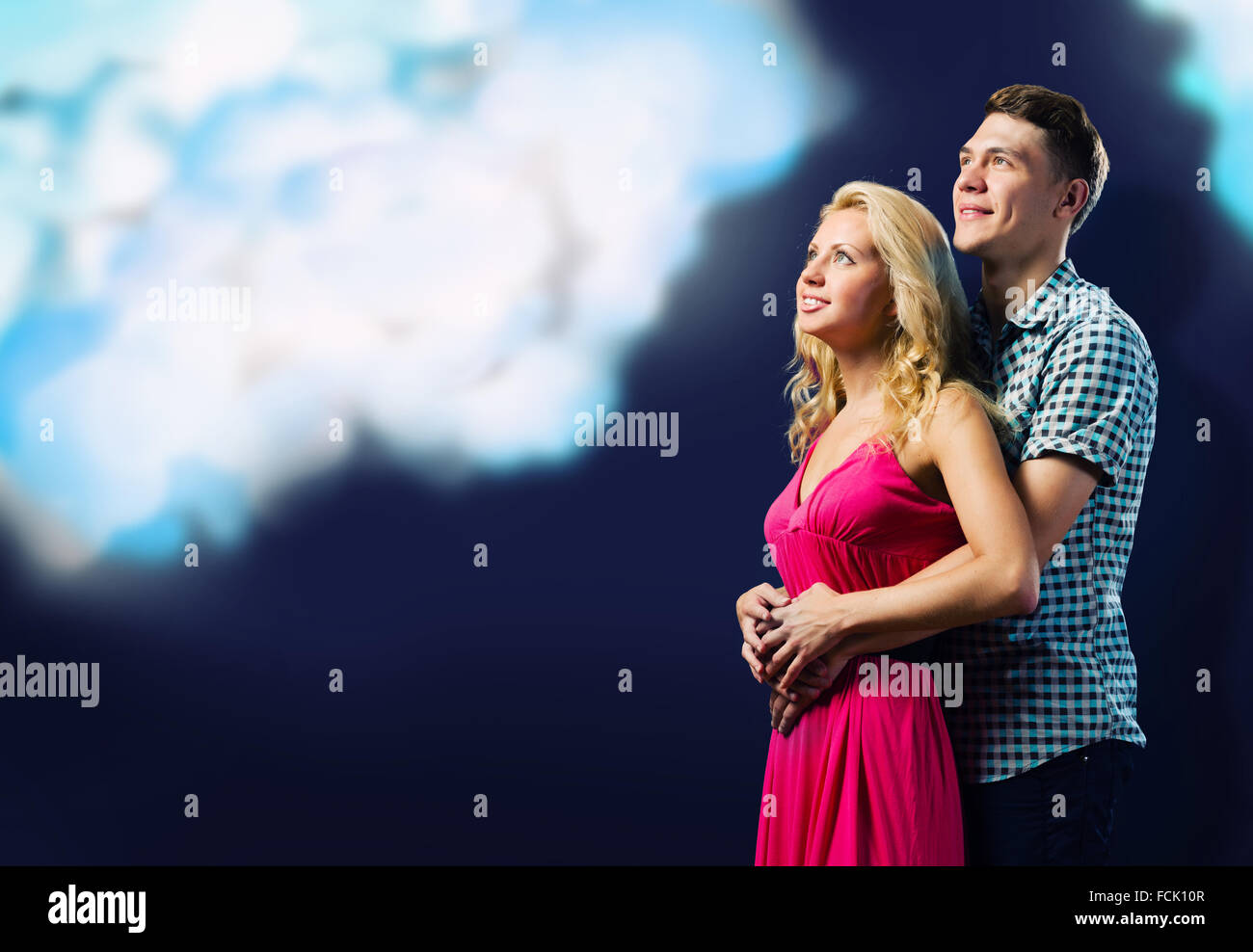 Young happy couple dreaming about family and future life Stock Photo ...