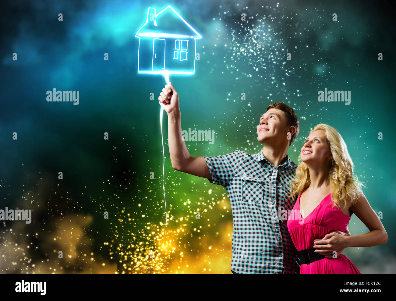 Young happy couple dreaming about family and future life Stock Photo ...