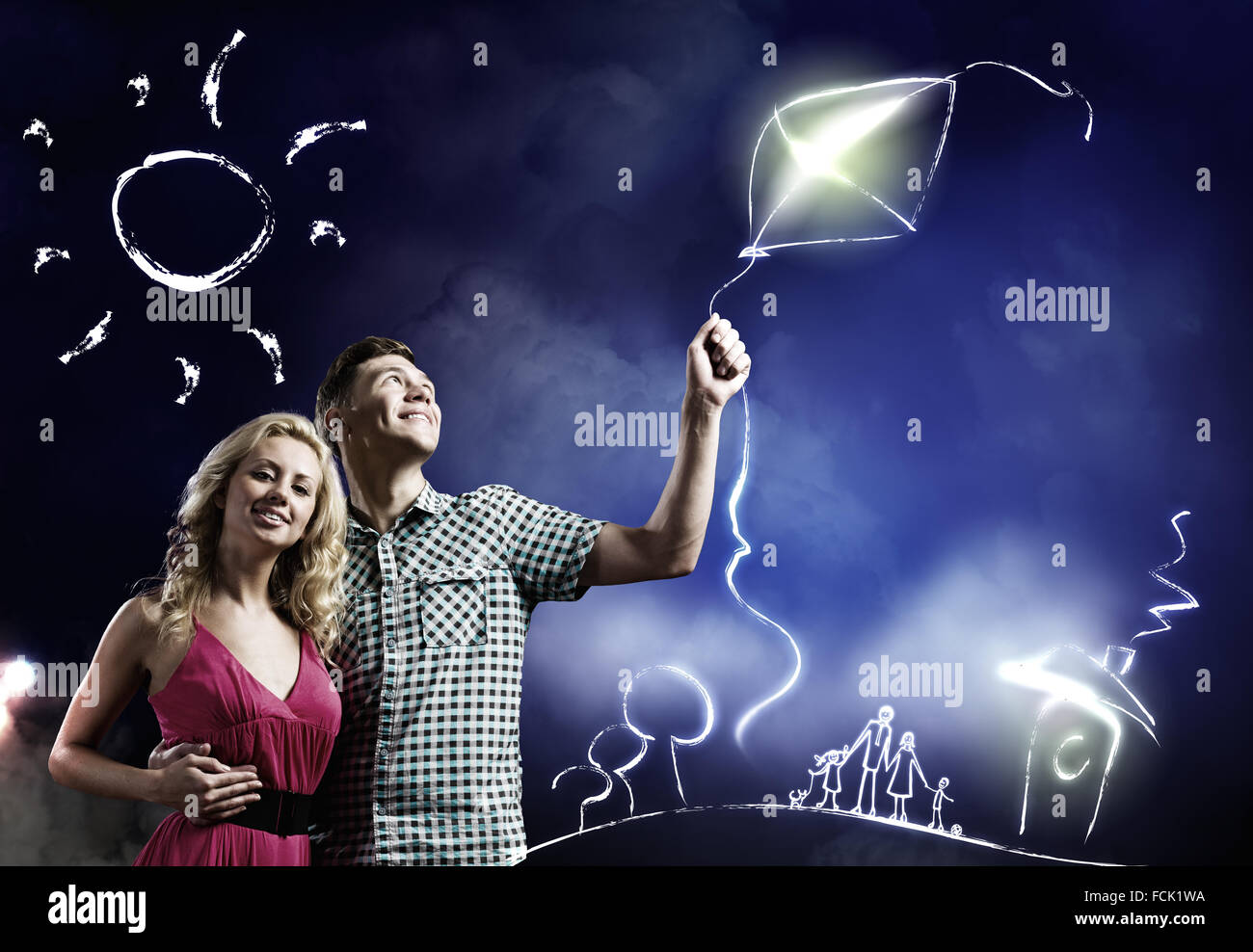 Young happy couple dreaming about family and future life Stock Photo ...