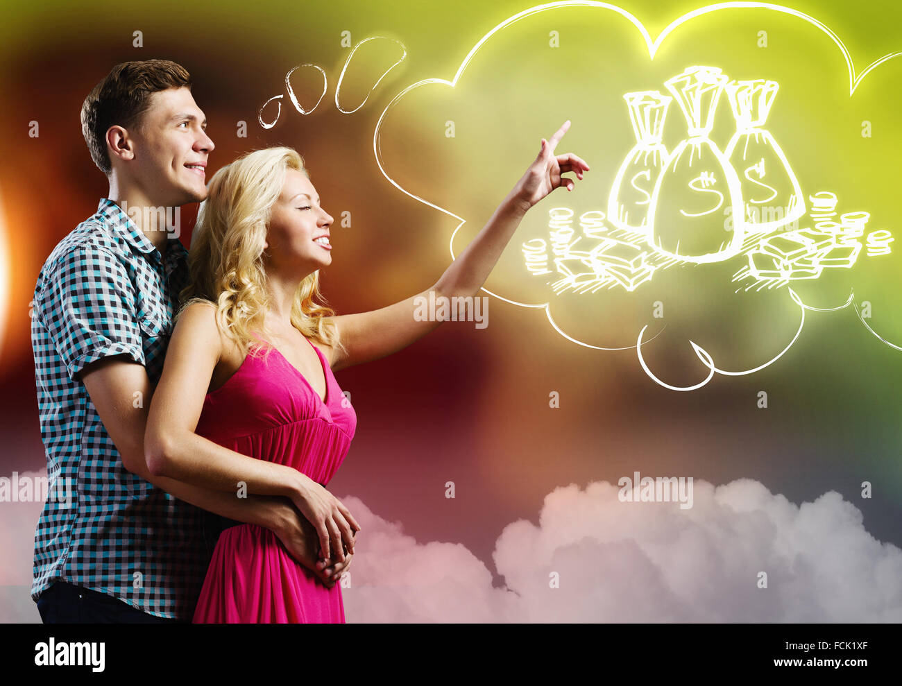 Young happy couple dreaming about future life Stock Photo - Alamy
