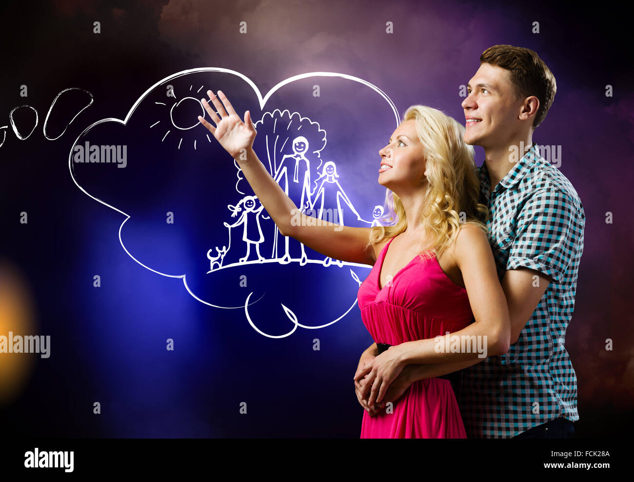 Young happy couple dreaming about family and future life Stock Photo ...