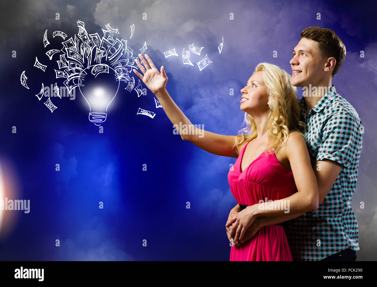 Young happy couple dreaming about future life Stock Photo - Alamy