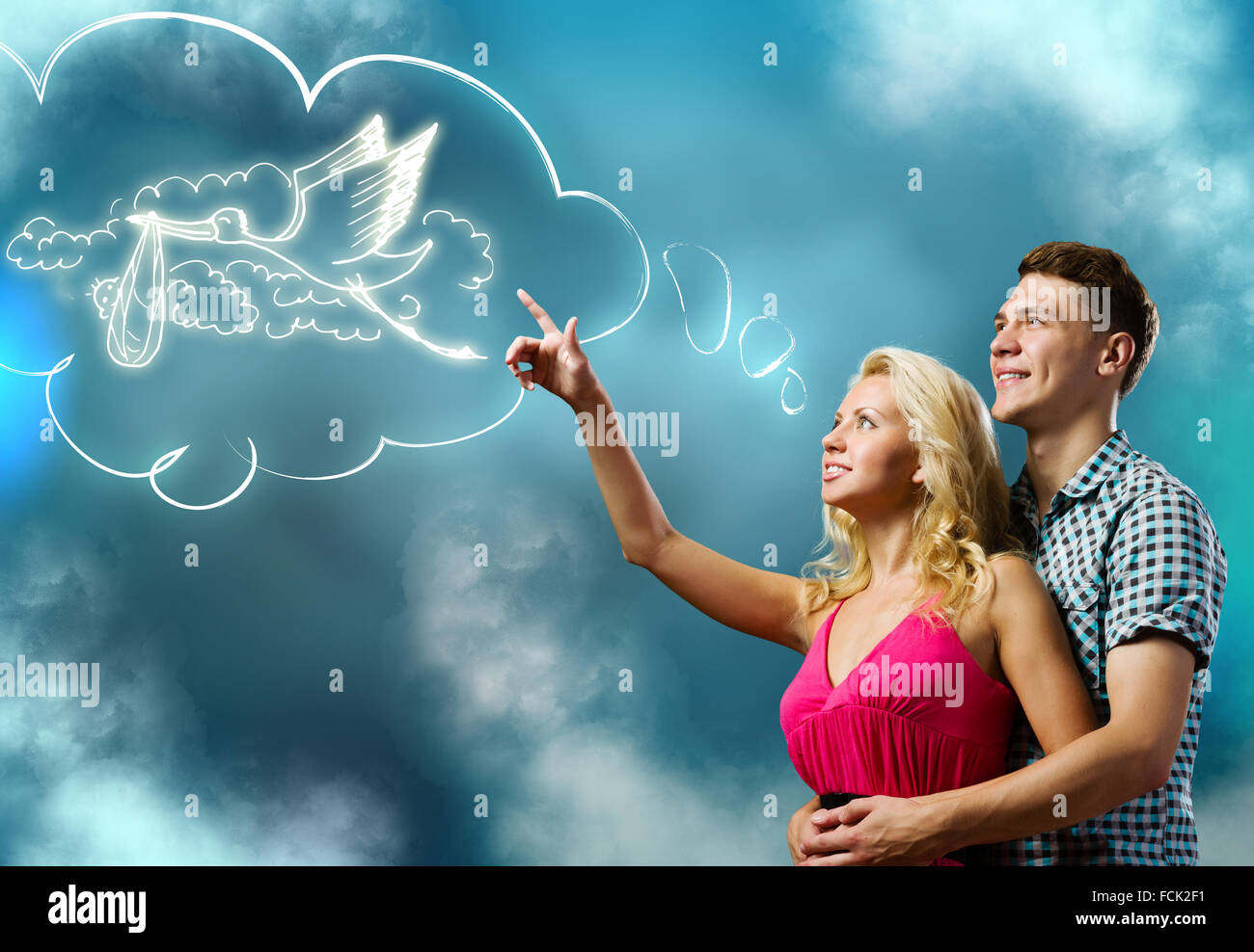 Young happy couple dreaming about family and future life Stock Photo ...
