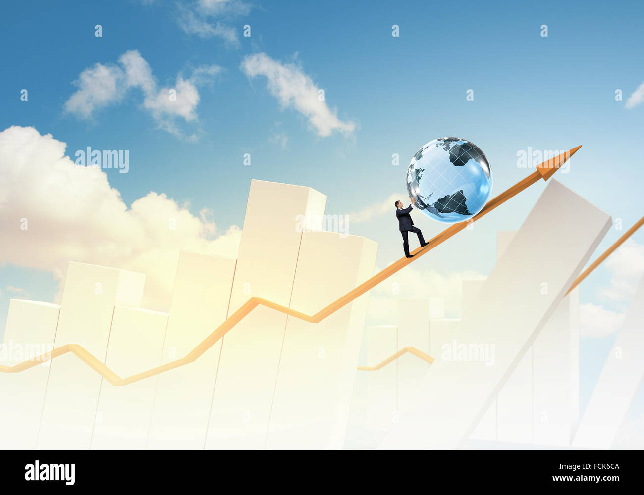 Young businessman rolling Earth planet up th hill Stock Photo - Alamy