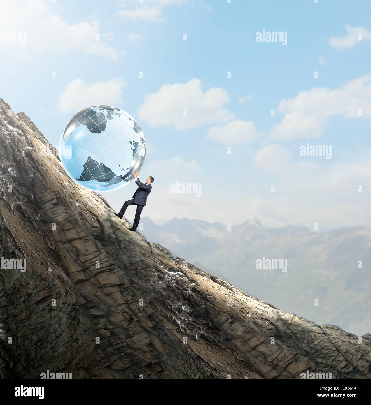 Young businessman rolling Earth planet up th hill Stock Photo - Alamy