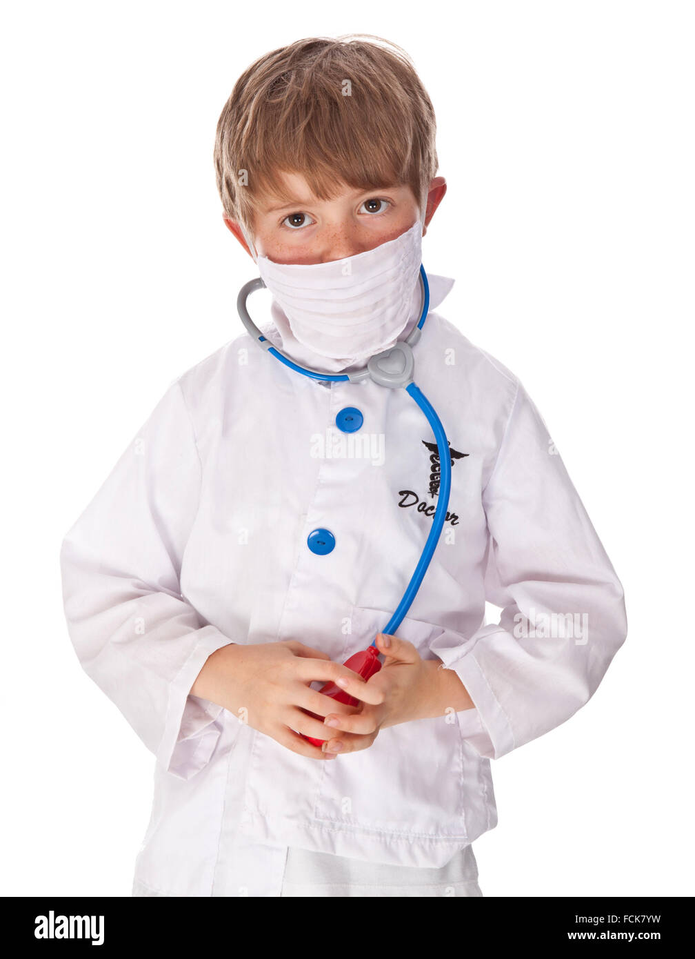 Young boy doctor isolated over a white background Stock Photo - Alamy