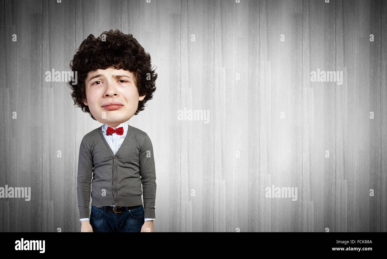 Funny crying young man with big head Stock Photo - Alamy