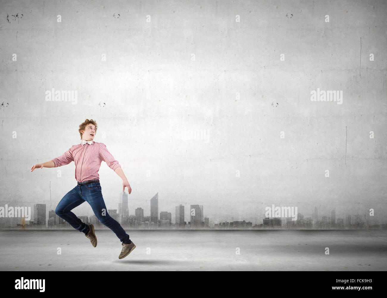 Man run away jeans hi-res stock photography and images - Alamy