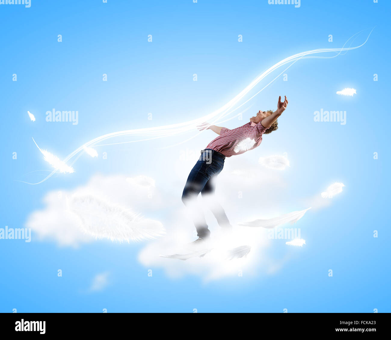 Young guy in casual evading from light rays Stock Photo - Alamy