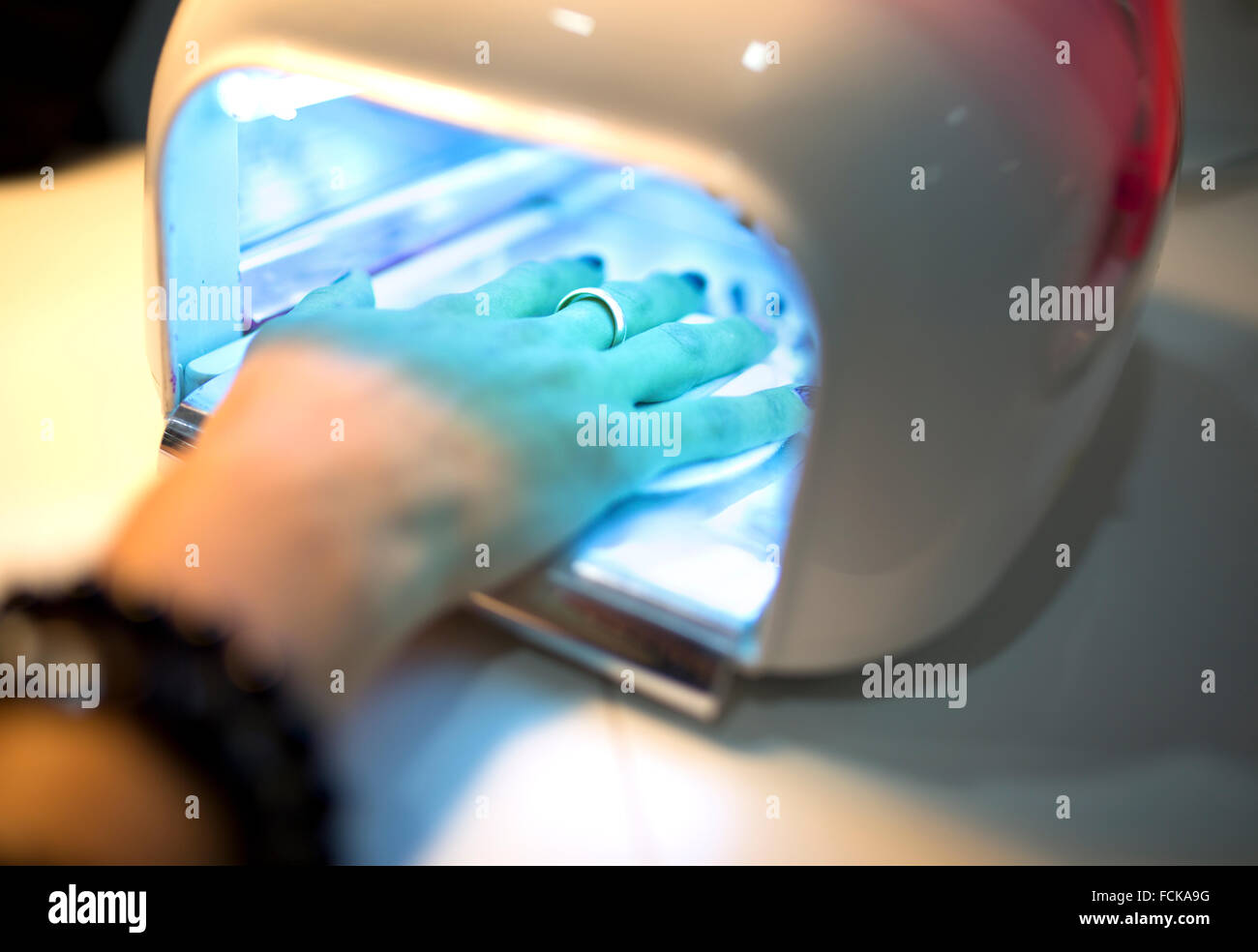 Nail grooming in beauty salon Stock Photo - Alamy