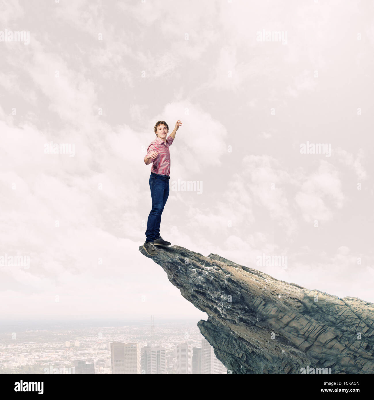 Man balancing on ledge on hi-res stock photography and images - Alamy