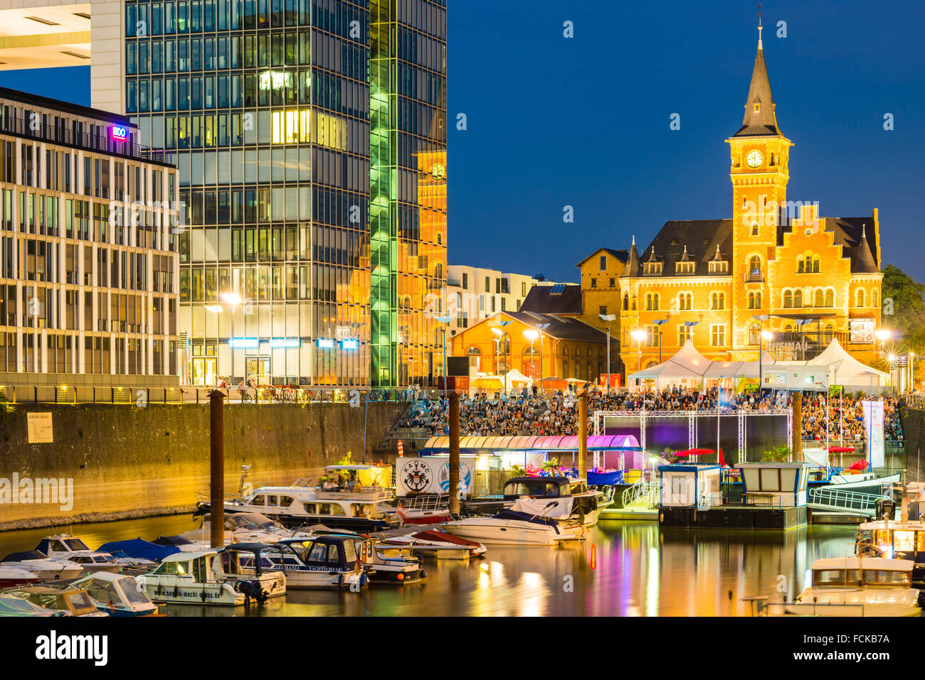 Germany Cologne open air cinema at lighted Rheinau harbour Crane House ...