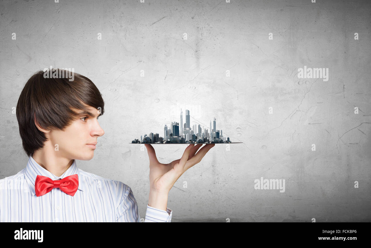 Young handsome man dj holding disco plate Stock Photo - Alamy