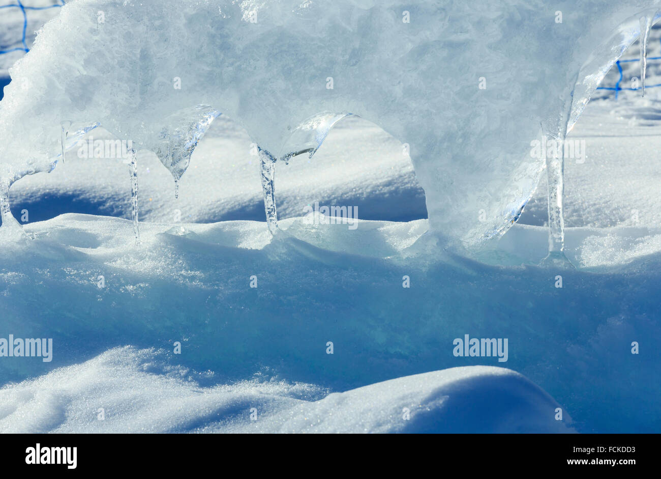 Melting glacial block of ice with icicles closeup Stock Photo - Alamy