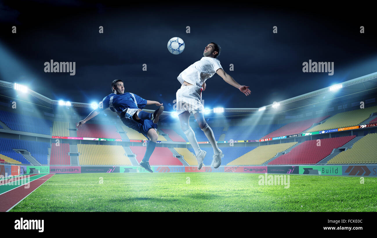 Football action head duel hi-res stock photography and images - Alamy
