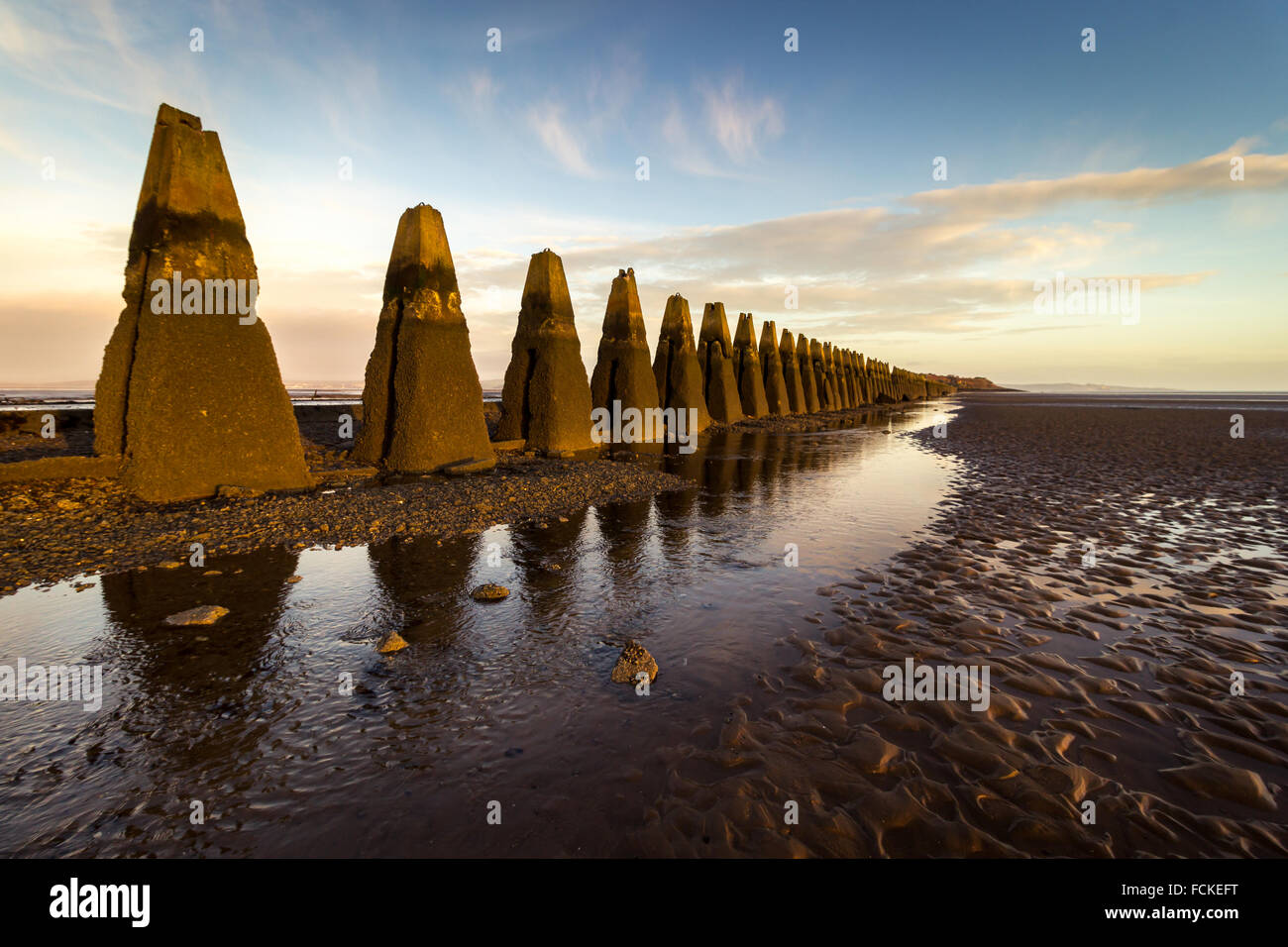 Sunrise at Cramond submarine defenses edinburgh Stock Photo - Alamy