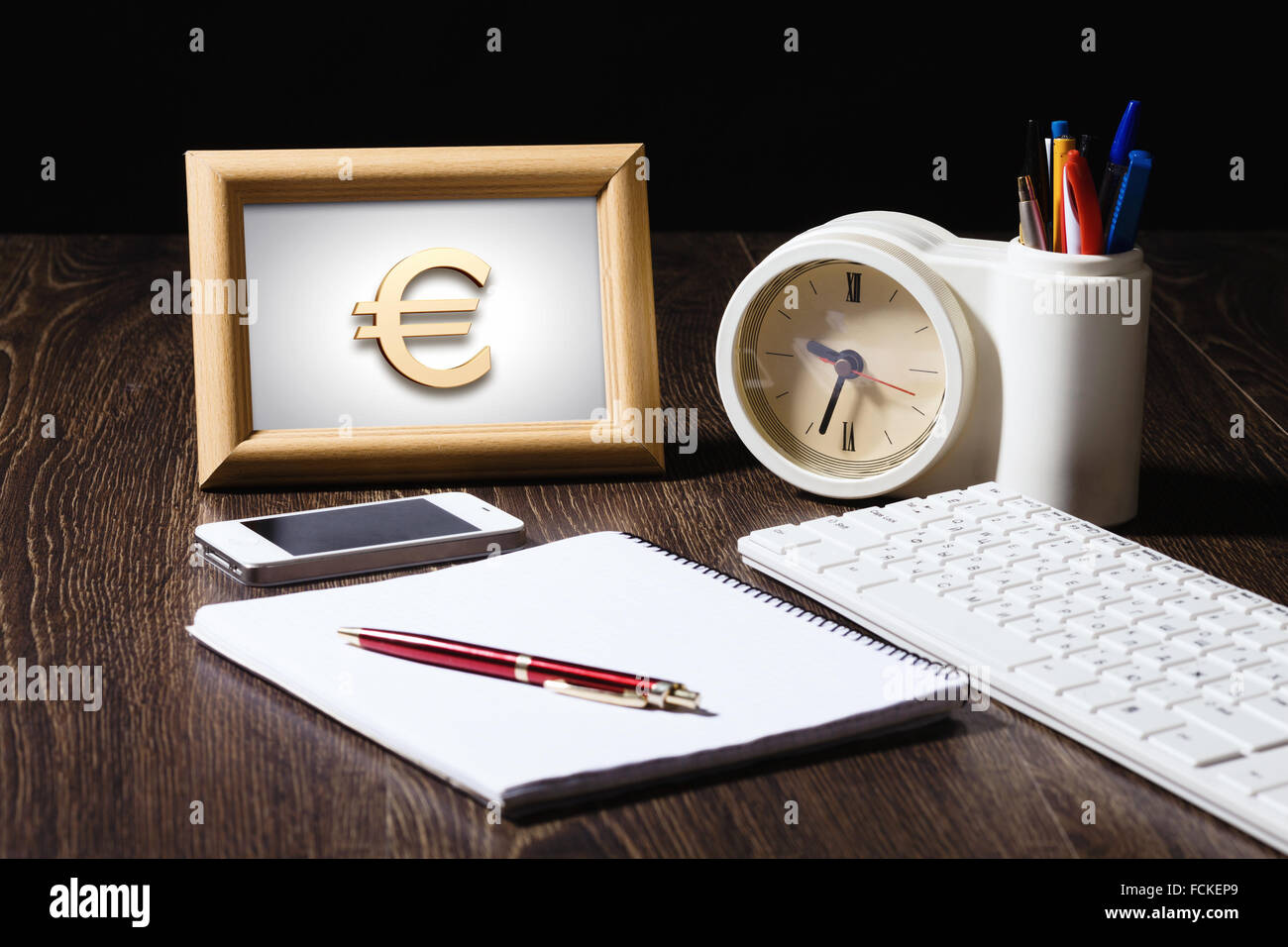 Close up of office workplace with notepad and keyboard Stock Photo - Alamy