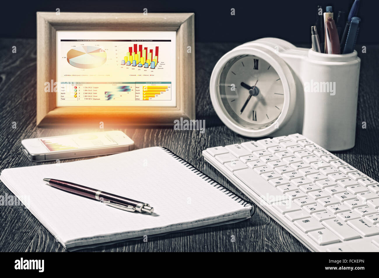 Close up of office workplace with notepad and keyboard Stock Photo - Alamy