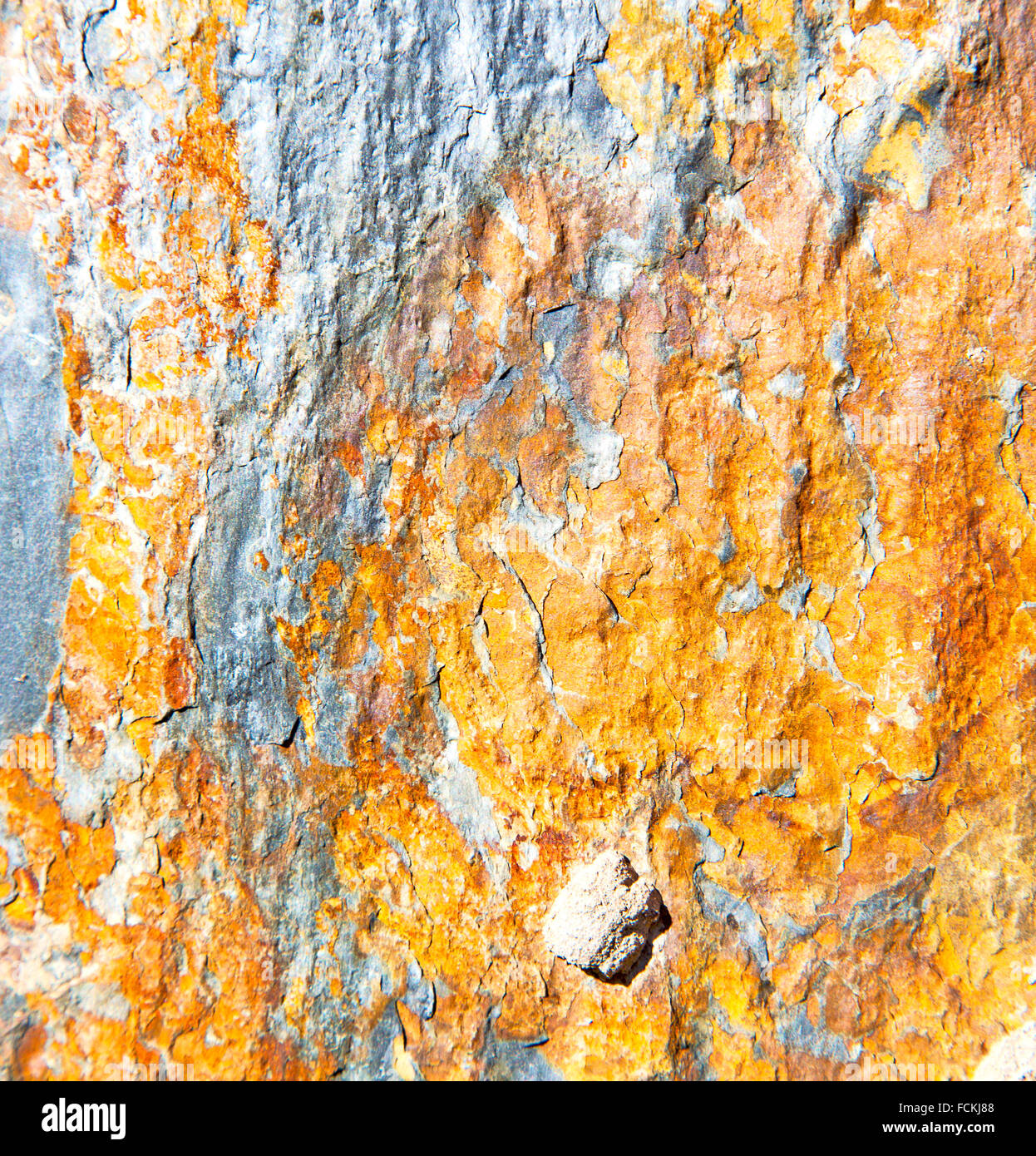 rocks stone and red orange gneiss in the wall of morocco Stock Photo ...