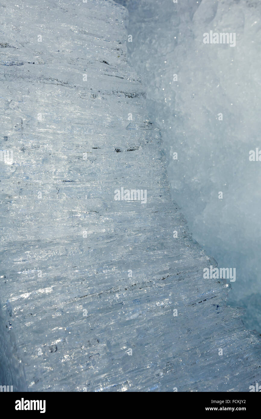 Glacial block of ice with interesting structure crystals macro. Winter ...