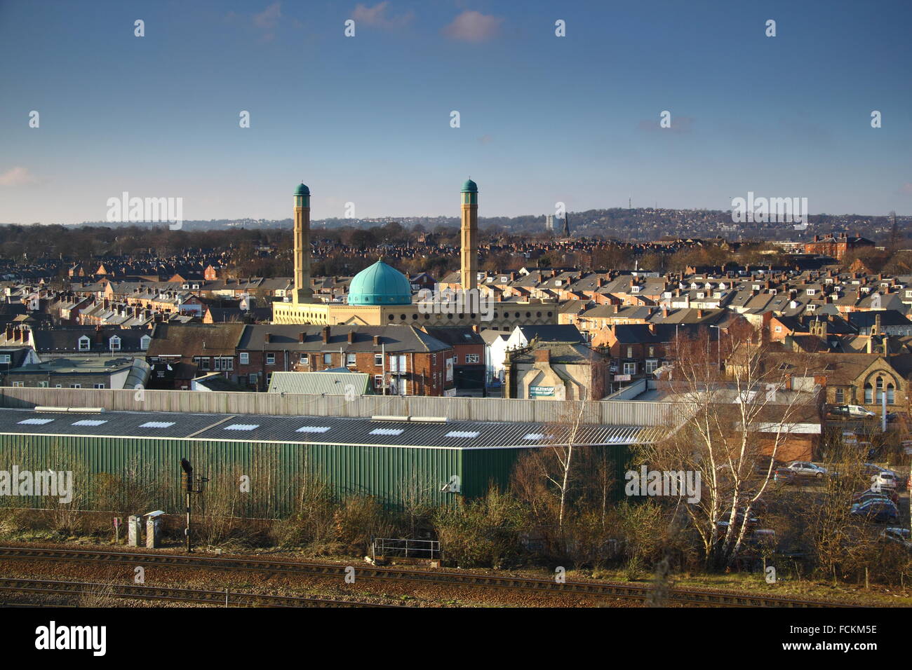 Skyline of Sheffield looking to the main rail line into the city, blue ...