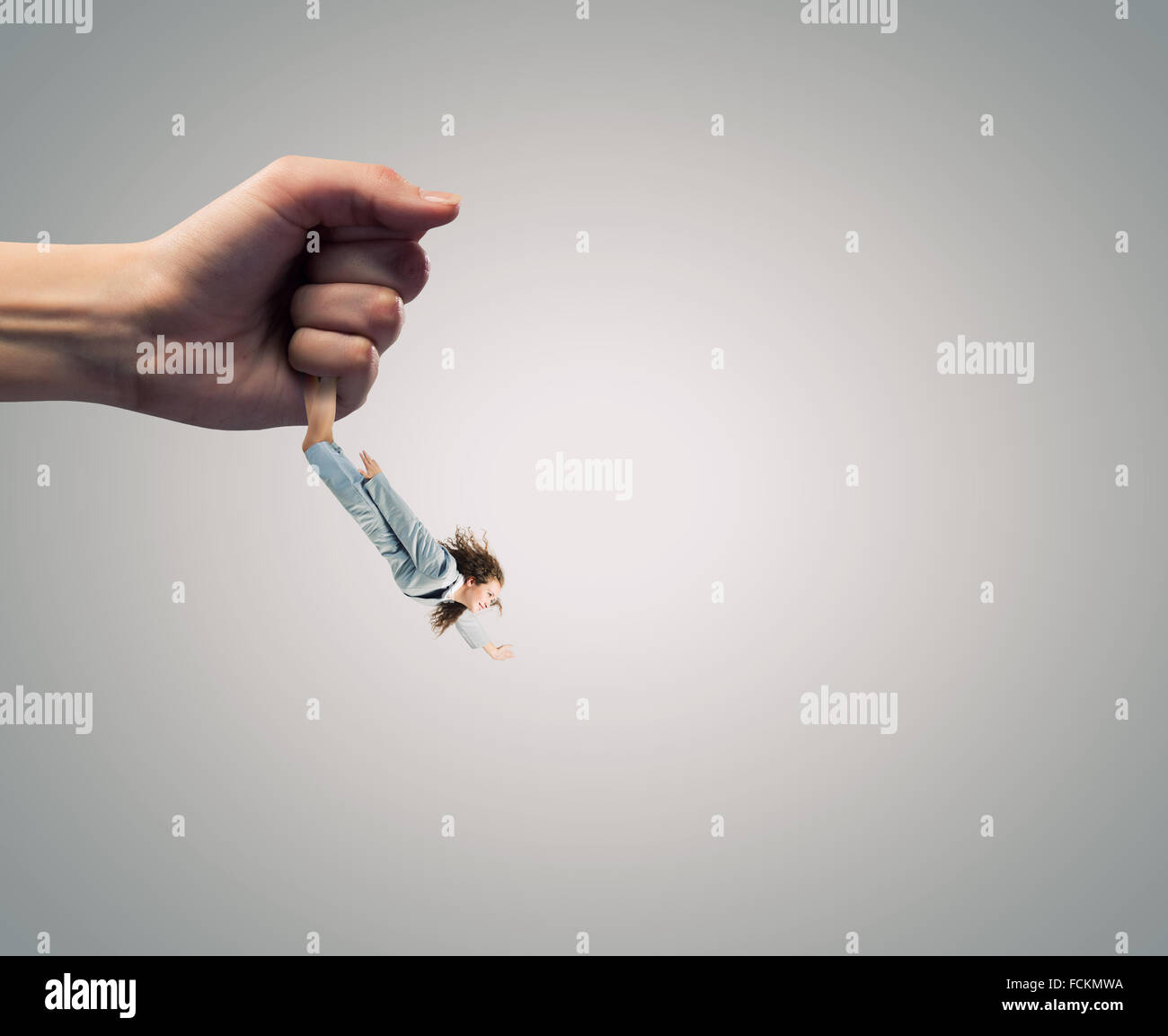 Giant human hand holding miniature hi-res stock photography and images ...