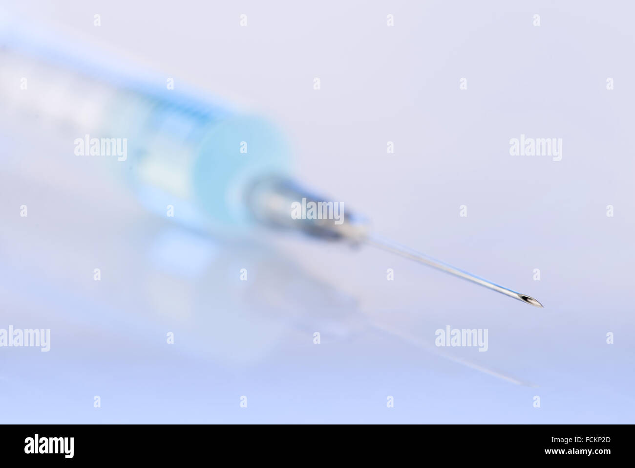 Sharp and hollow needle of the syringe Stock Photo - Alamy
