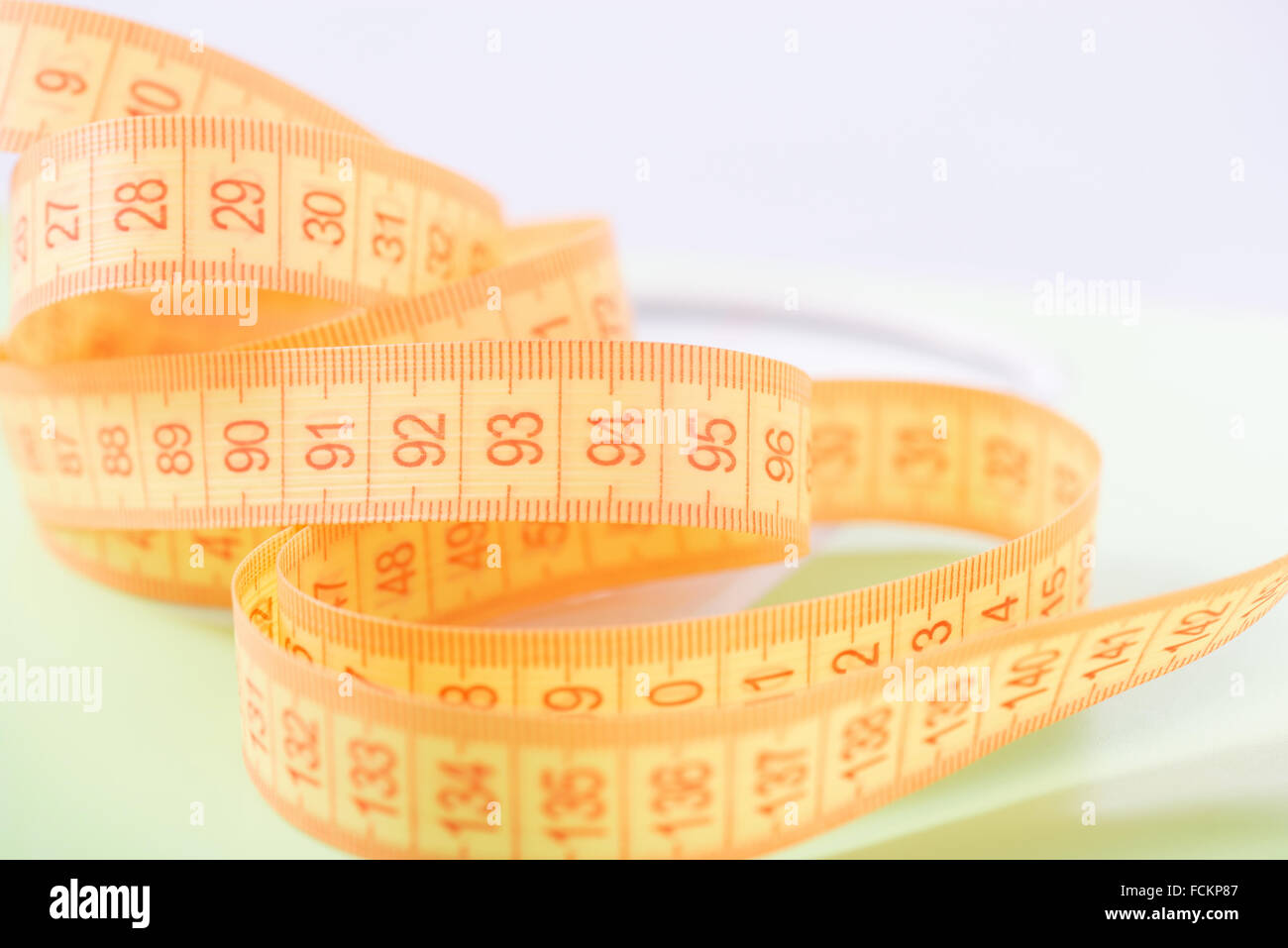 Body measuring tape is on the surface Stock Photo - Alamy