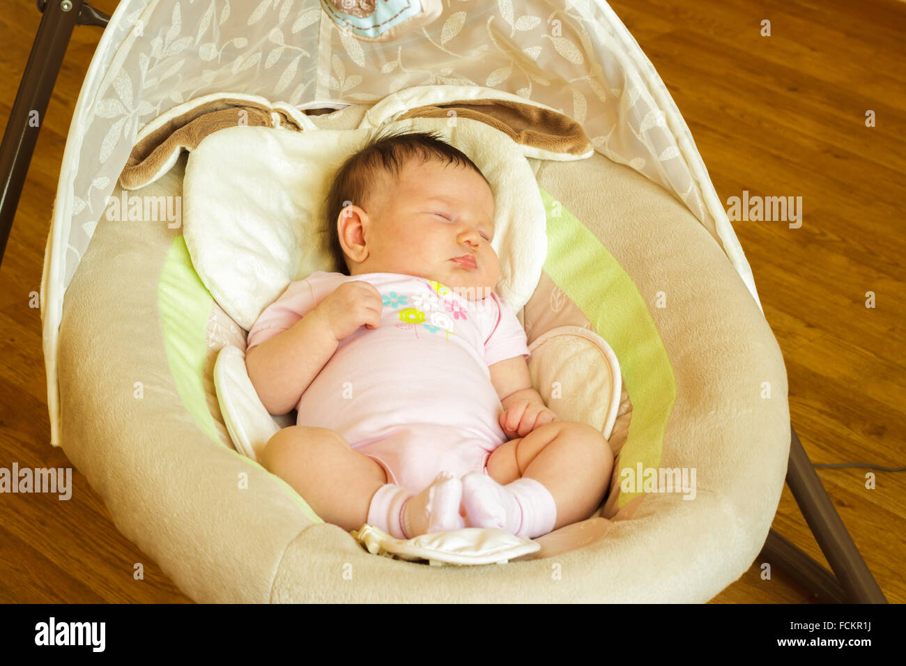 Baby in the cradle hi-res stock photography and images - Alamy