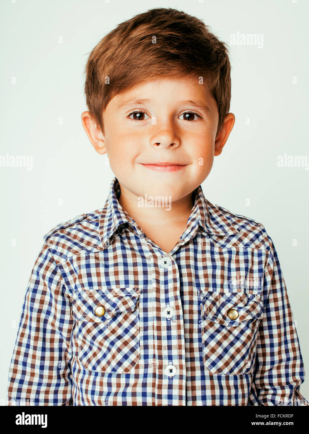little cute real boy on white background gesture smiling close up Stock ...