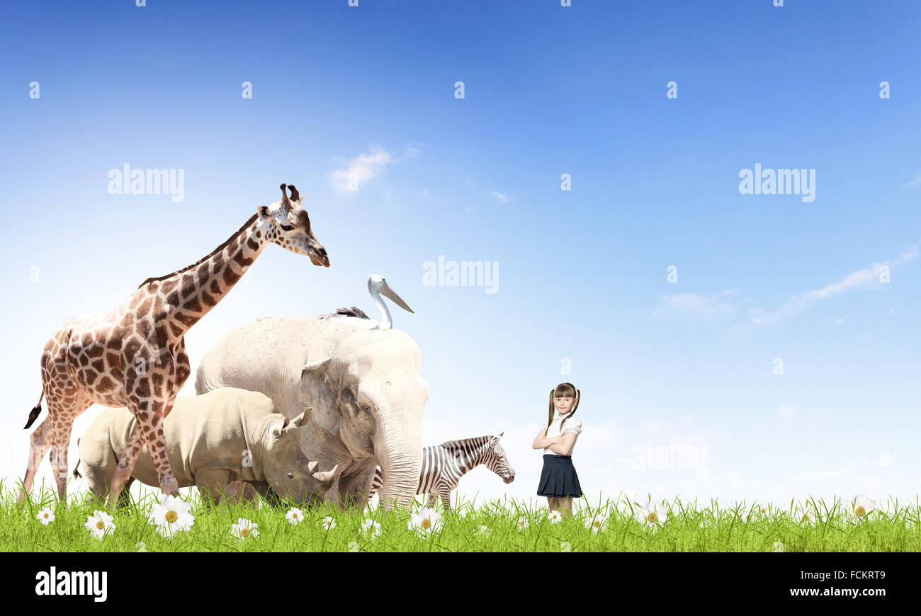Cute school girl outdoor with wild animals Stock Photo - Alamy