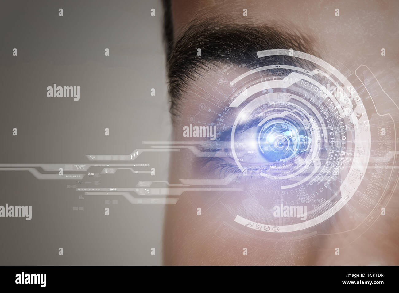 Close up of man eye with digital icons Stock Photo - Alamy