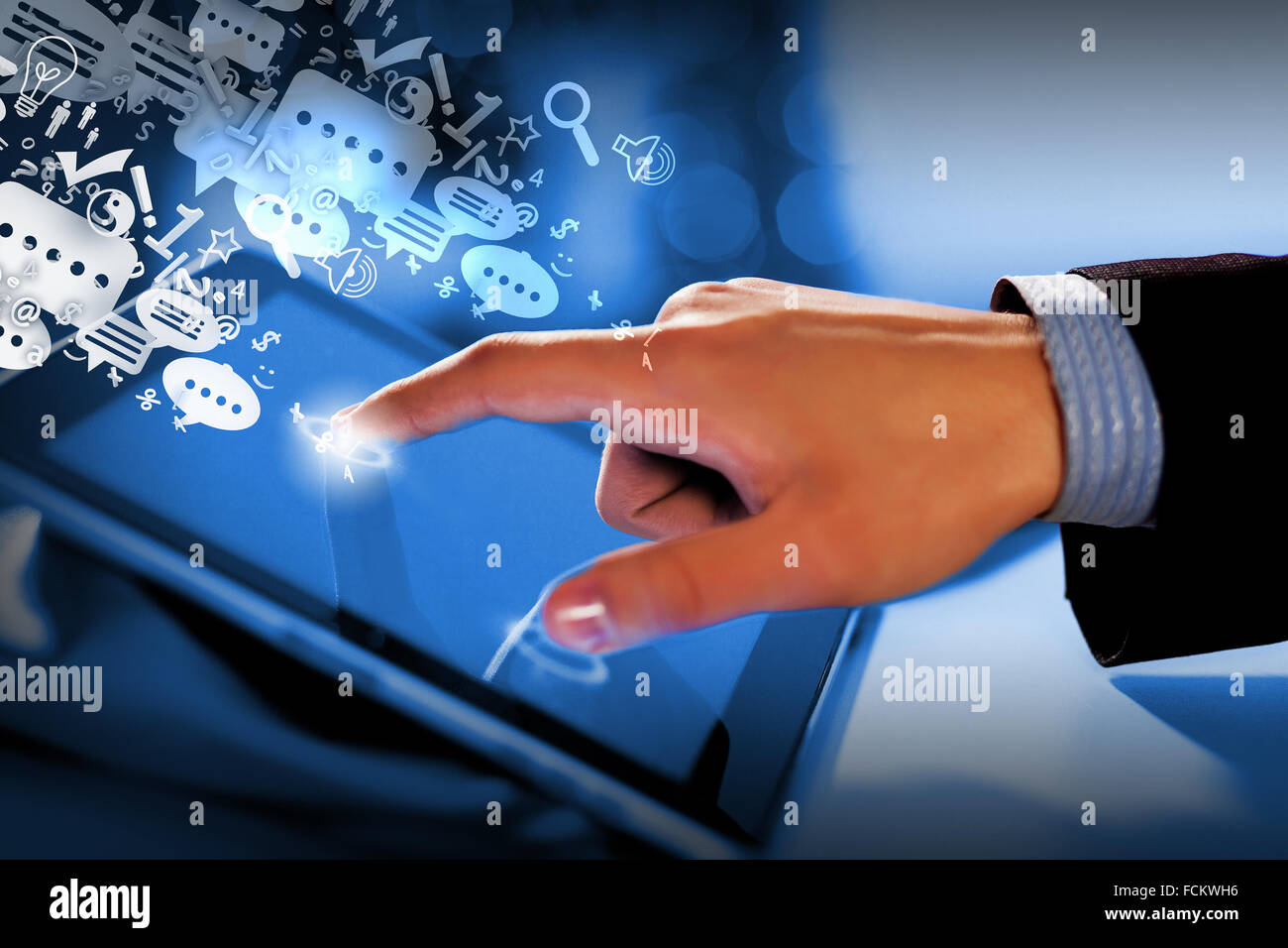 Close up of human hand touching screen of tablet Stock Photo - Alamy