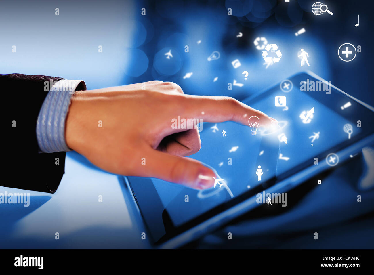 Close up of human hand touching screen of tablet Stock Photo - Alamy