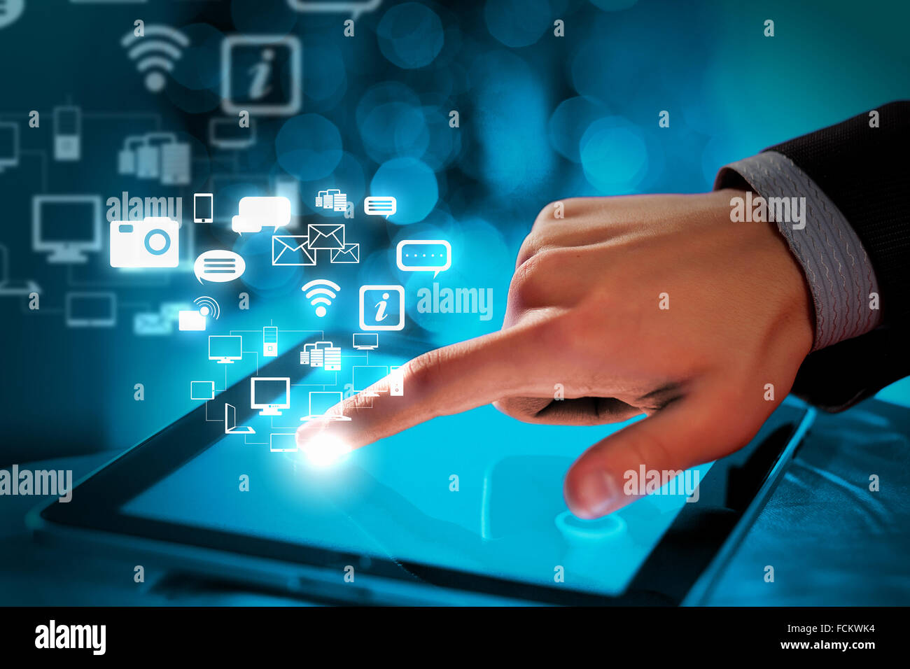 Close up of human hand touching screen of tablet Stock Photo - Alamy