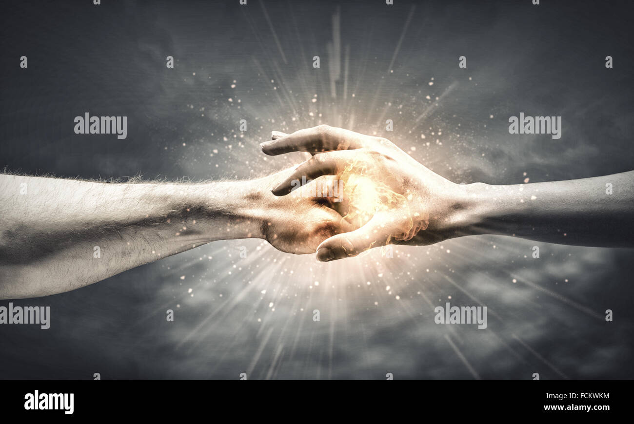 One hand preventing punch attack of another hand Stock Photo - Alamy