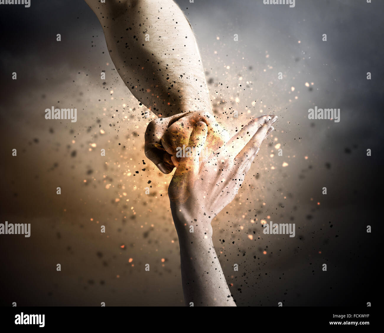 One hand preventing punch attack of another hand Stock Photo - Alamy