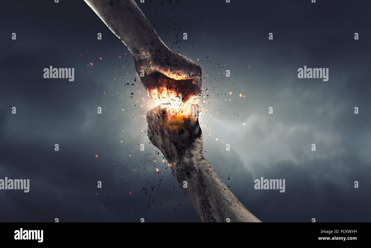 One hand preventing punch attack of another hand Stock Photo - Alamy