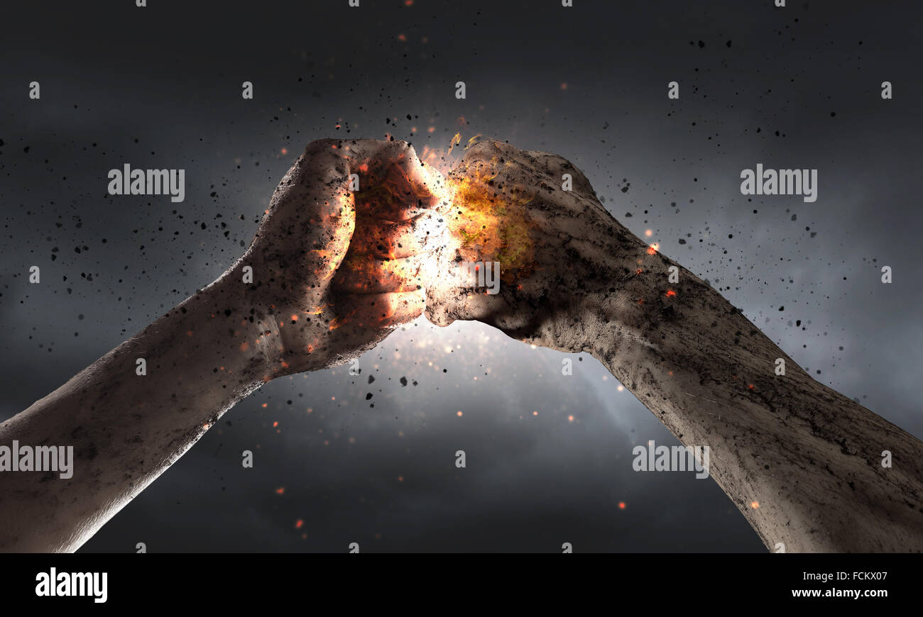 One hand preventing punch attack of another hand Stock Photo - Alamy