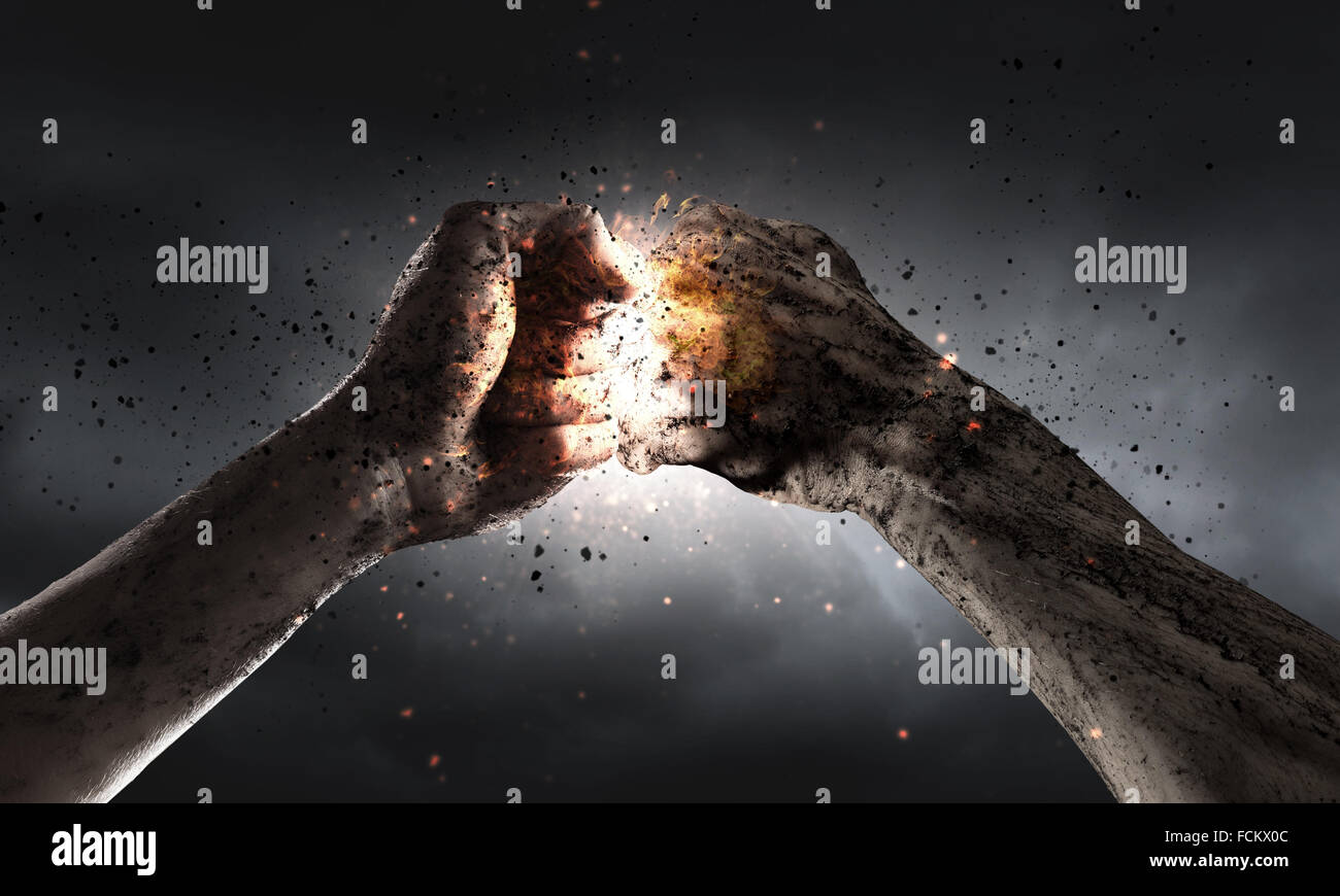 One hand preventing punch attack of another hand Stock Photo - Alamy