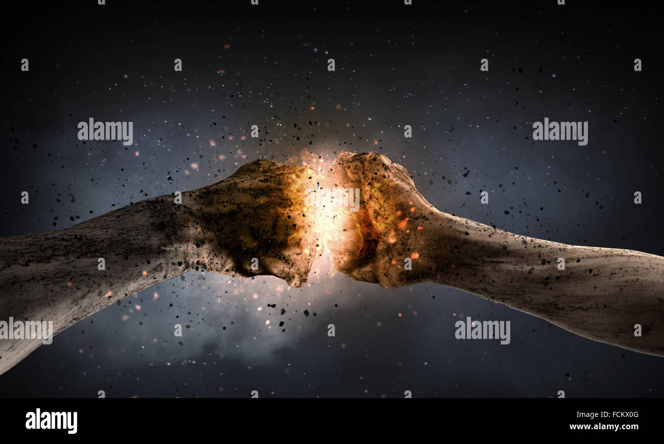 One hand preventing punch attack of another hand Stock Photo - Alamy