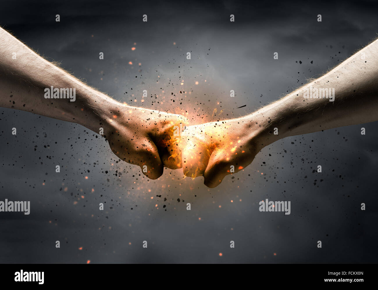 One hand preventing punch attack of another hand Stock Photo - Alamy