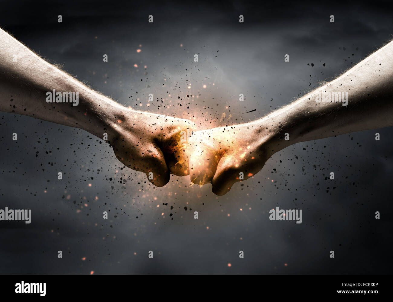 One hand preventing punch attack of another hand Stock Photo - Alamy