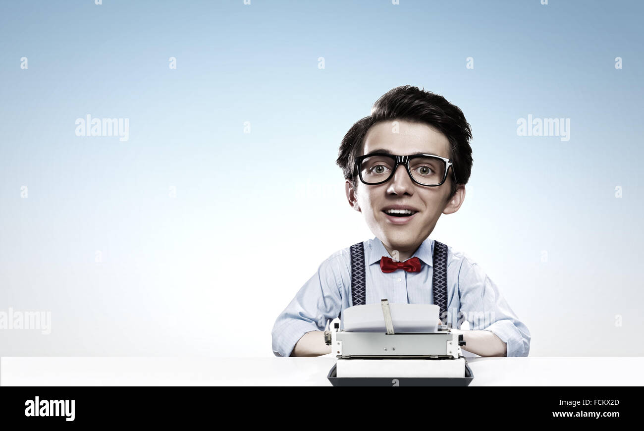 Young funny man writer with big head Stock Photo - Alamy