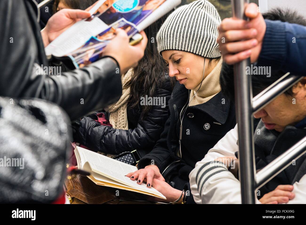 Subway seat reading hi-res stock photography and images - Alamy