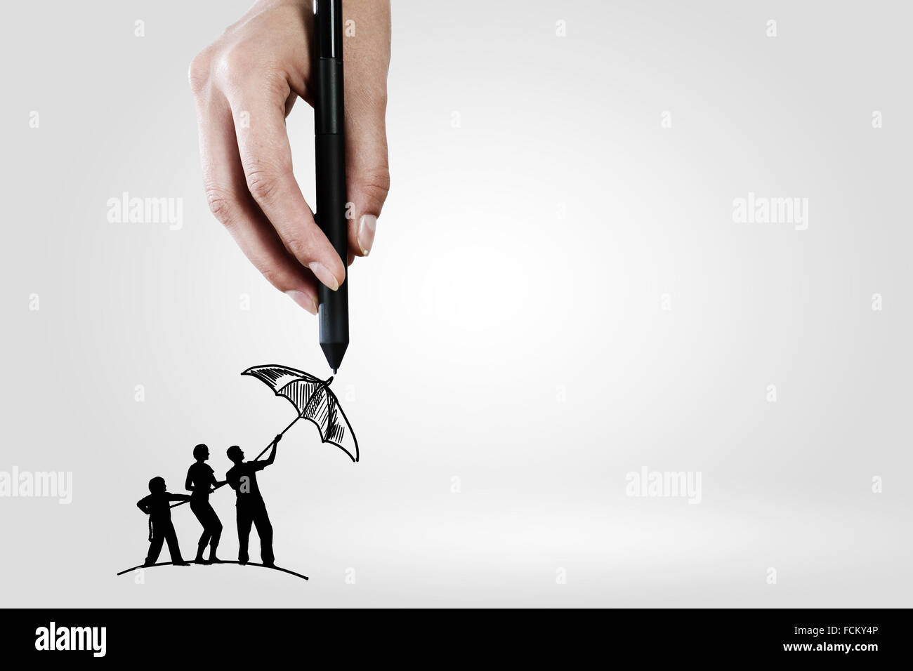 Close up of hand drawing sketches of happy family Stock Photo - Alamy
