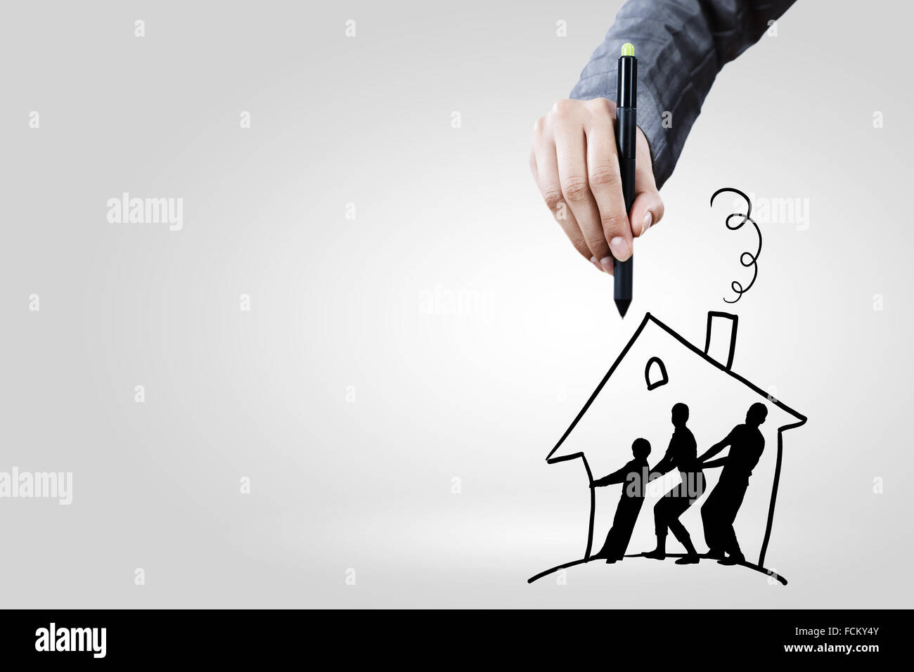 Close up of hand drawing sketches of happy family Stock Photo - Alamy
