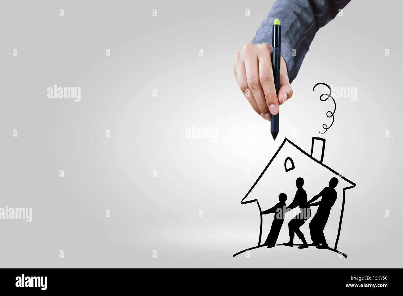 Close up of hand drawing sketches of happy family Stock Photo - Alamy
